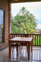 Quarto Duplo Deluxe, 1 cama king-size, varanda, vista para o jardim | Terraço/pátio interior