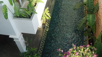 Quarto Premium, varanda, vista para a piscina | Vista para o pátio