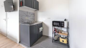 Estúdio luxo | Cozinha privada | Geladeira, micro-ondas, cooktop, chaleira elétrica