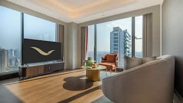 Suíte executiva, 1 cama King, acessível | Área de estar