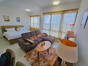 Apartamento Comfort, Vista para a cidade | Sala de estar | Base para iPod 