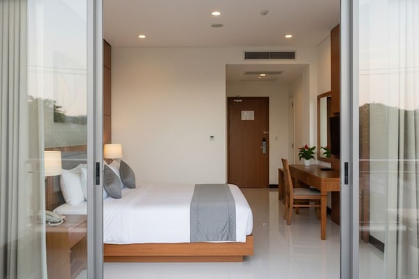 Quarto Quádruplo Premium, varanda, vista para o jardim | Vista da varanda