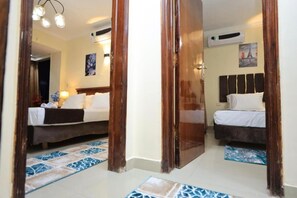 Quarto Individual Deluxe, Vista para a cidade | Roupa de alta qualidade, edredões de penas 
