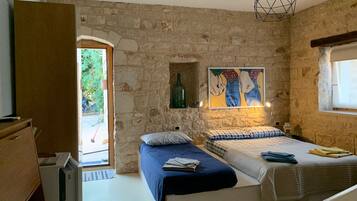 Quarto Quádruplo Familiar, vista para o jardim | Quartos insonorizados, ferro/tábua de engomar, Wi-fi grátis