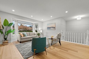 Suíte conforto, 3 quartos, vista para o jardim | Área de estar