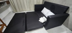 Apartamento família, 2 quartos, cozinha | Área de estar