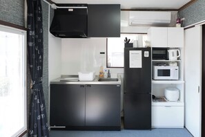 Apartamento | Cozinha privada | Um frigorífico, um micro-ondas, um forno, uma placa de cozinha 