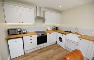Apartamento | Cozinha privada | Geladeira, micro-ondas, fogão, cooktop