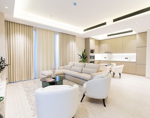 Apartamento Premium | Sala de estar | Televisor LED de 65 polegadas com canais por cabo, Netflix