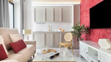 Apartamento, 1 quarto, varanda, na torre | Sala de estar | TV de ecrã plano