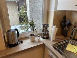 Apartamento Comfort, casa de banho privativa, vista para o rio | Cozinha privada | Uma cadeira de bebé 