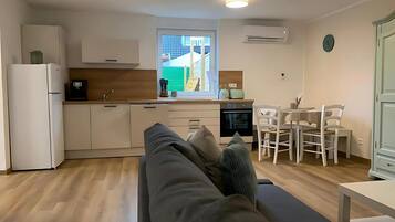 Apartamento Comfort, vista para o jardim | Cozinha privada