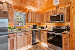 Cabana conforto, vista para o jardim | Cozinha privada