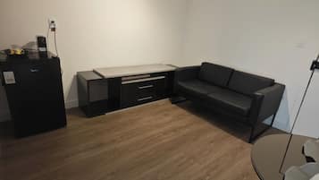 Apartamento, 1 cama Queen, para não fumantes | Área de estar