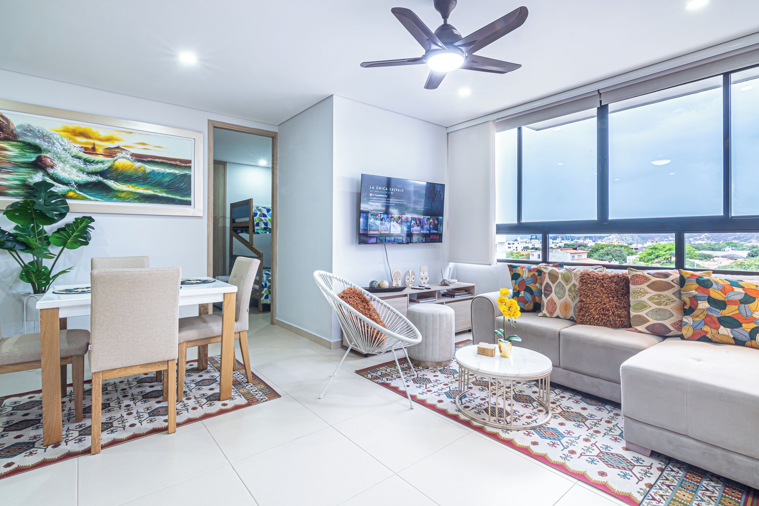 Apartamento, 2 quartos, acessível, sacada | Sala de estar | Livros