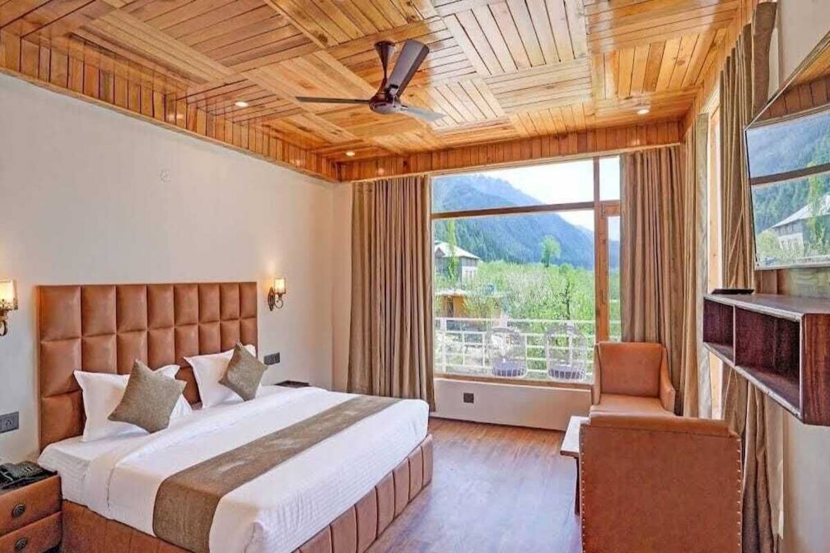 Quarto Deluxe, varanda, vista para a montanha | Secretária, Wi-fi grátis