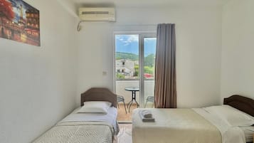 Quarto família, varanda coberta, vista para o jardim | Vista do quarto