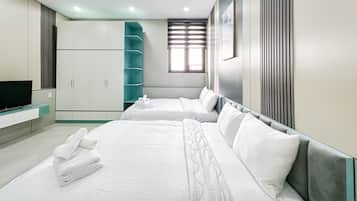 Suite Familiar, 2 camas queen-size, casa de banho anexa, vista para o jardim | Com decoração personalizada, com mobília individualizada, secretária