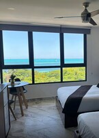 Quarto panorâmico, vista para o mar | Vista para praia/oceano