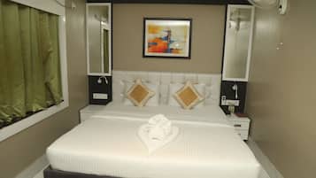 Quartos à prova de som, Wi-Fi de cortesia, roupa de cama