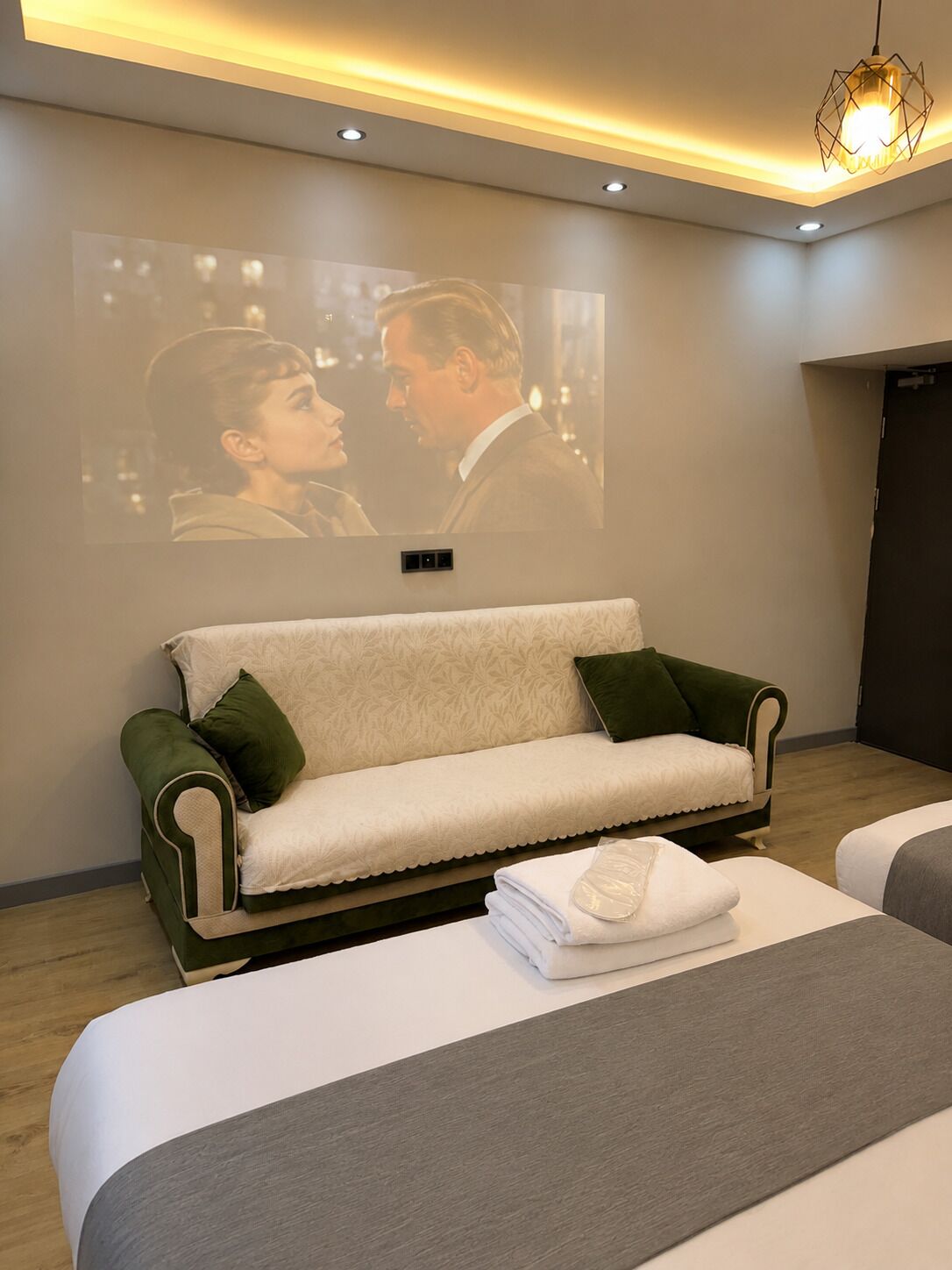 Quarto Quádruplo Deluxe, vista para o jardim | Sala de estar