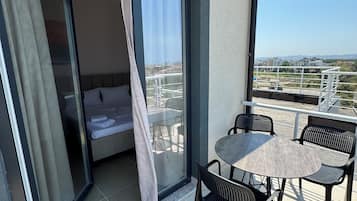 Quarto casal luxo | Terraço/pátio