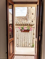 Apartamento família, sacada | Terraço/pátio