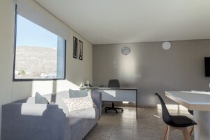 Apartamento Comfort, Vista para a cidade | Sala de estar