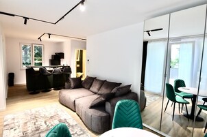 Cobertura luxo | Área de estar | TV de tela plana