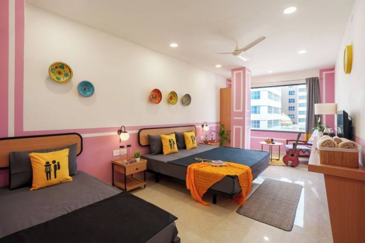 Quarto Triplo Deluxe, Vista para a cidade | Quartos insonorizados, Wi-fi grátis, roupa de cama fornecida