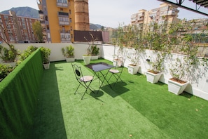 Quarto Quádruplo Familiar, vista para o jardim | Vista do quarto
