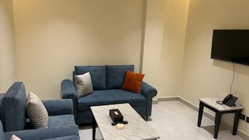 Apartamento Familiar, Vista para a cidade | Sala de estar