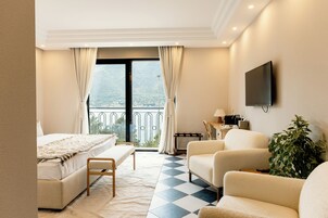 Quarto casal luxo, vista para o mar | Frigobar, cofres nos quartos, cortinas blackout, quartos à prova de som