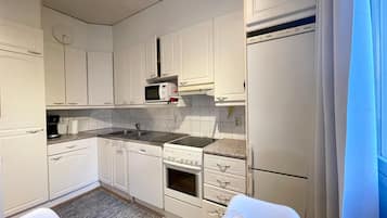 Apartamento Comfort, 1 quarto, varanda, vista para o pátio | Cozinha privada