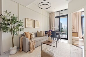 Apartamento econômico | Área de estar | Smart TV 50 polegadas com canais digitais