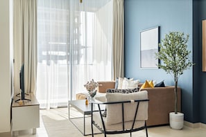 Apartamento Comfort | Sala de estar | Smart TV