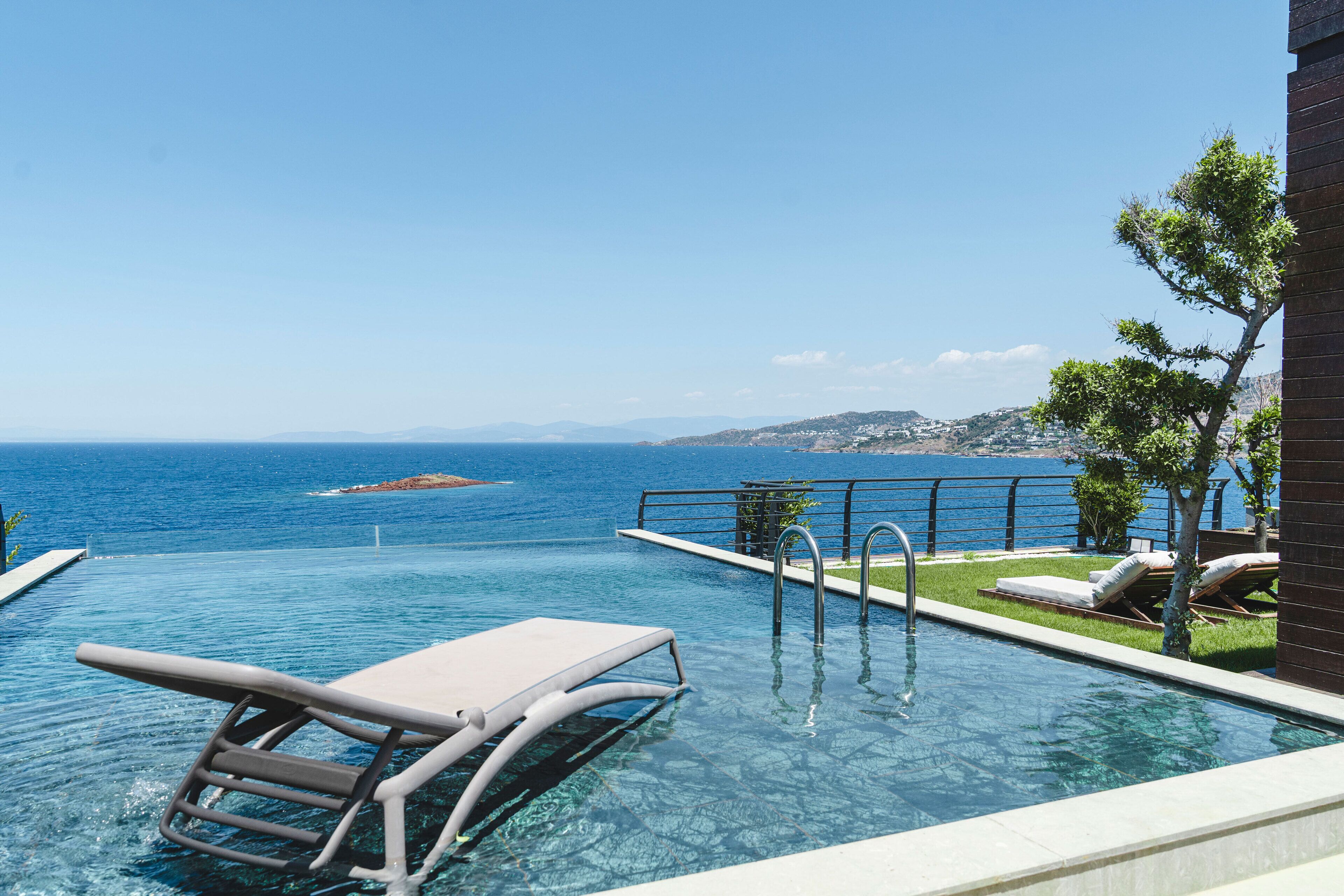 Villa Superior, vista para o mar | Roupa de alta qualidade, minibar, Wi-fi grátis, roupa de cama fornecida 