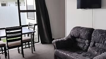 Suite Familiar, pátio | Sala de estar
