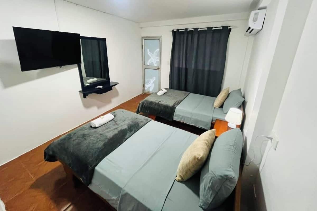 Quarto Twin Standard | Roupa de cama fornecida
