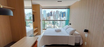 Apartamento básico | Wi-Fi de cortesia, roupa de cama