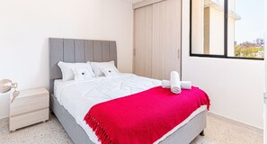 Apartamento Comfort, Vista para a cidade | 2 quartos, cortinas/cortinados opacos, ferro/tábua de engomar 