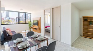 Apartamento Comfort, Vista para a cidade | Sala de estar