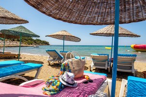 Uma praia privada nas proximidades, toldos de praia gratuitos 