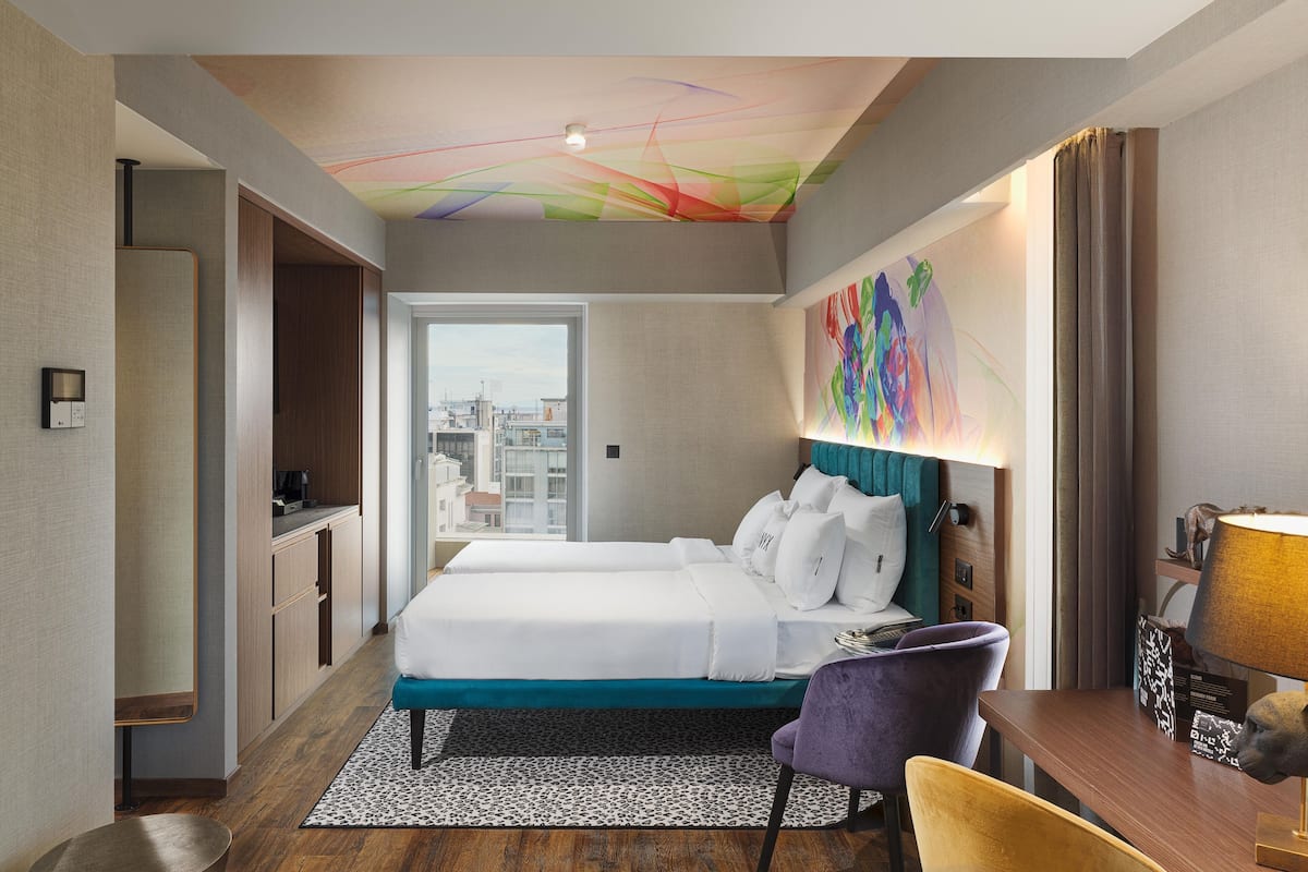 NYX Suite Sea View with Business Lounge Access | 1 quarto, minibar, secretária, Wi-fi grátis