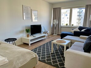 Apartamento conforto, 2 quartos, vista para a cidade | Ferros/tábuas de passar roupa, Wi-Fi de cortesia