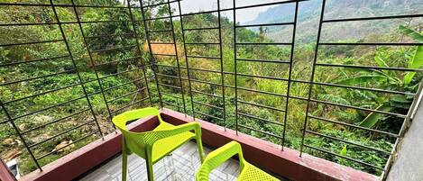 Quarto casal luxo, vista para a montanha | Sacada