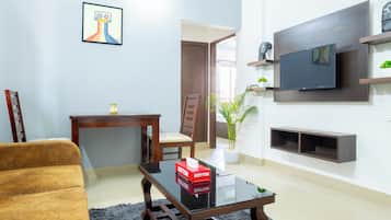 Estúdio, vista para a cidade | Área de estar