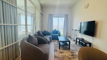 Apartamento, varanda, Vista para a cidade | Sala de estar