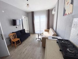 Quarto Triplo Familiar, vista para o mar | Minibar, Wi-fi grátis, roupa de cama fornecida 