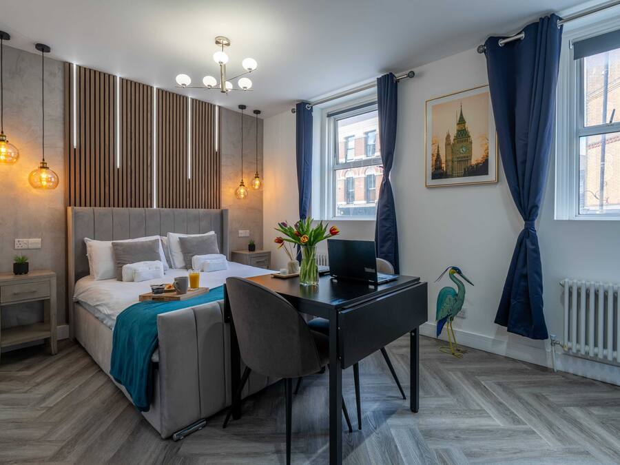 Suíte estúdio luxo, 1 cama Queen, vista para a cidade | Parte interna